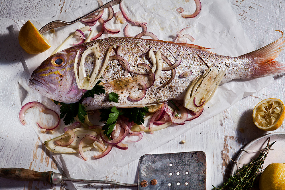 Whole baked fish with fennel, onion and parsley - Joanna Rushton